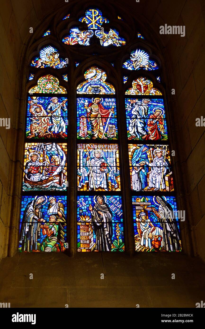 Czech Republic, Prague - colorful stained glass window in public Saint ...
