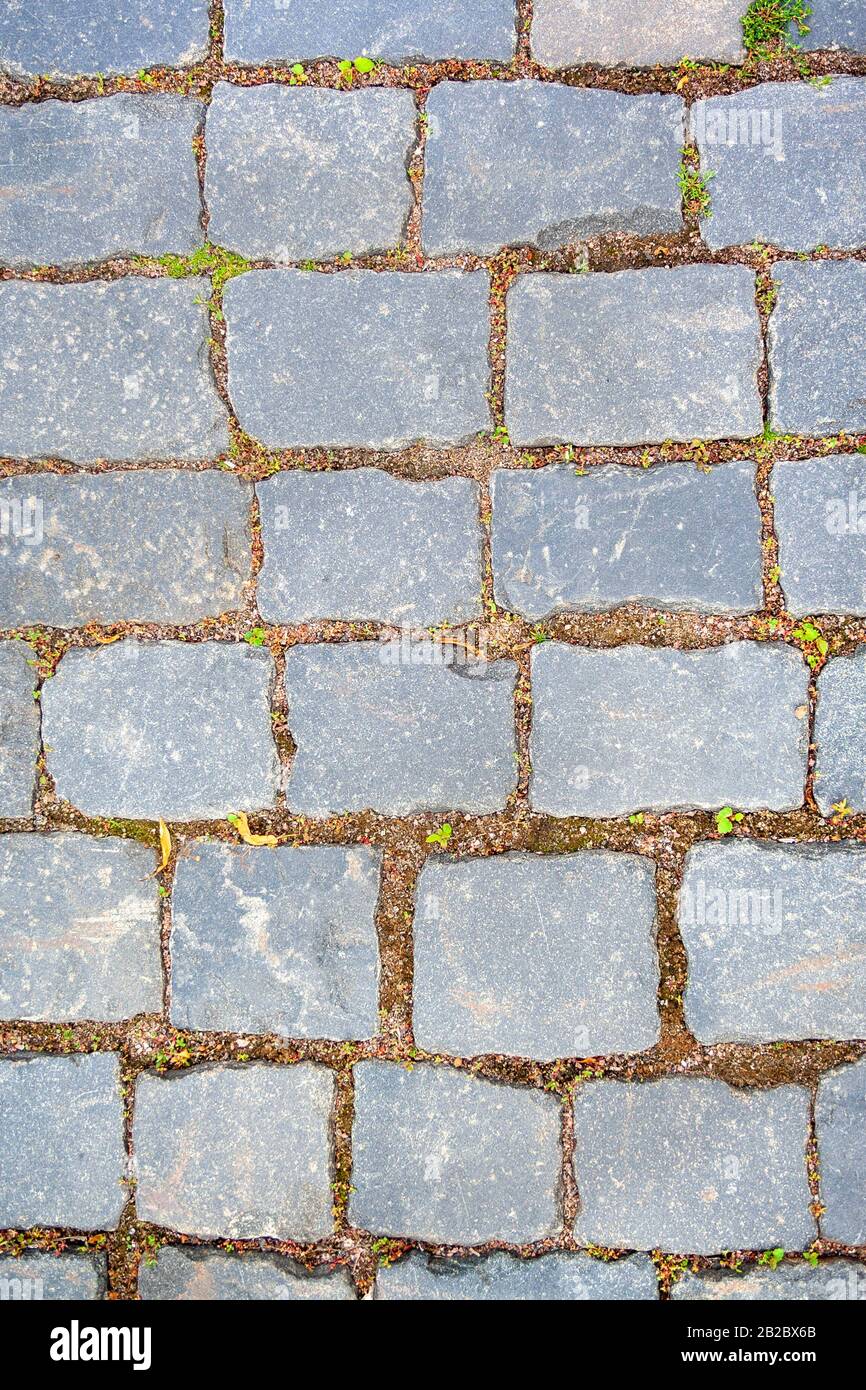 Old aged granite paving stones. Texture of old granite paving stones ...