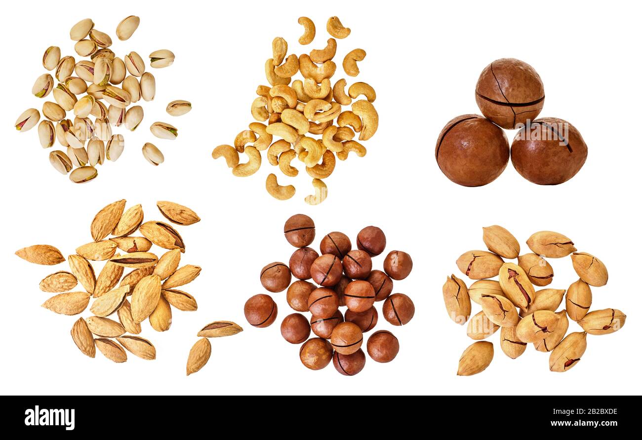 set of assorted nuts with clipping path on a white isolated background ...