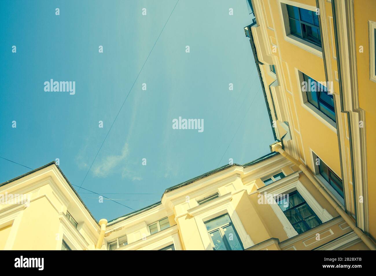 Saint-Petersburg in Russia courtyard with orange rough walls shot from ...