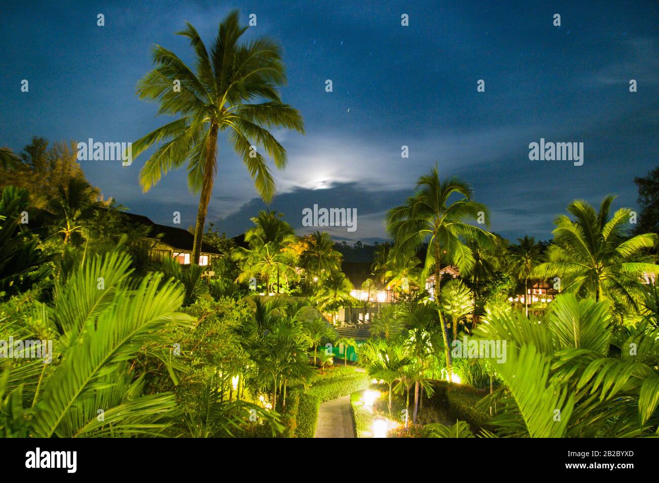 Luxury hotel with pool at night Stock Photo - Alamy