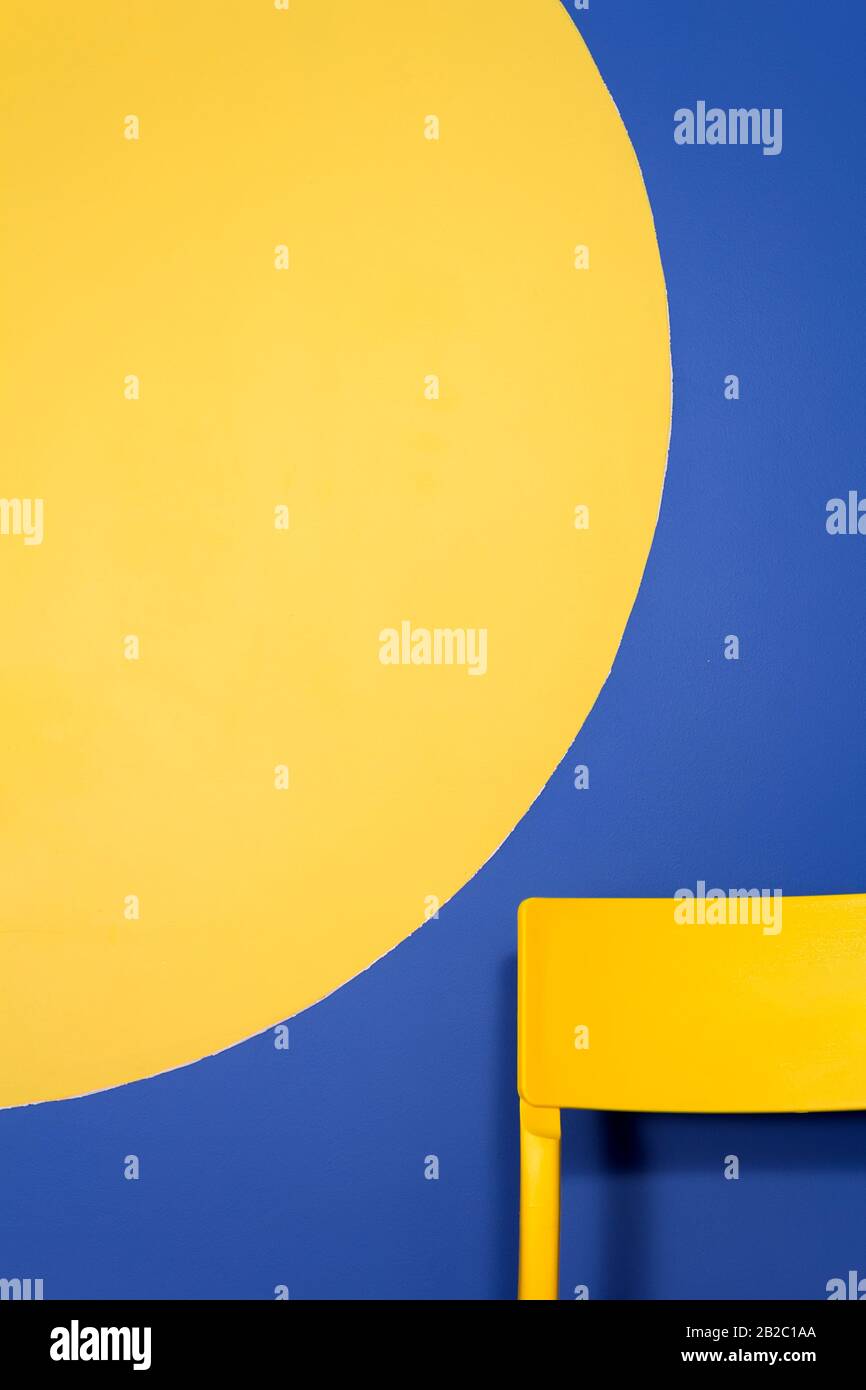 Conceptual modern color block interior design. Yellow chair and yellow ...