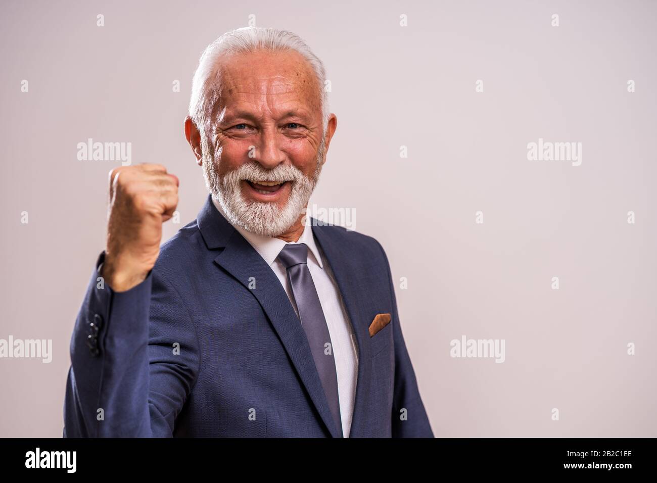 Portrait senior old businessman celebrating hi-res stock photography ...