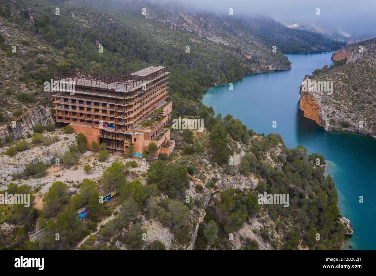 Air view of the abandoned construction of a hotel in the Bolarque swamp ...