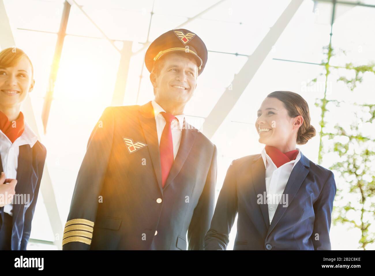 Woman airline pilot walking hi-res stock photography and images - Alamy