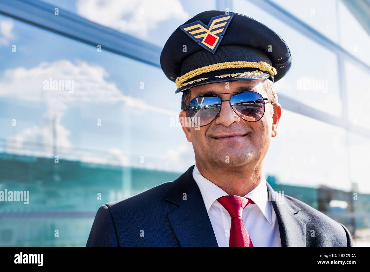 Mature pilot in uniform hi-res stock photography and images - Alamy