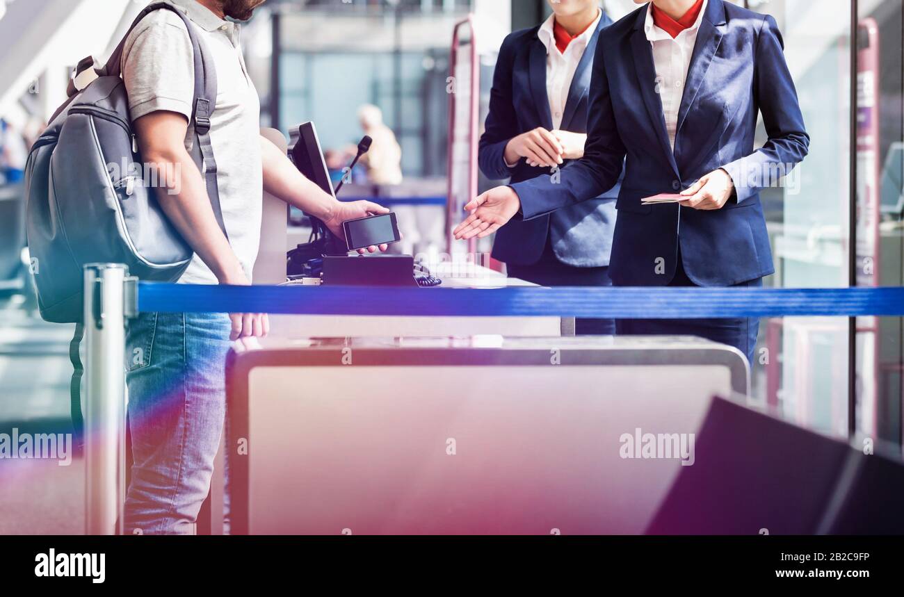 Woman scanning boarding pass on phone hi-res stock photography and ...