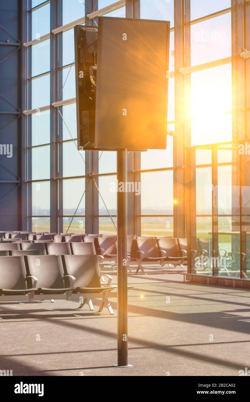 Flight display monitor in airport Stock Photo - Alamy