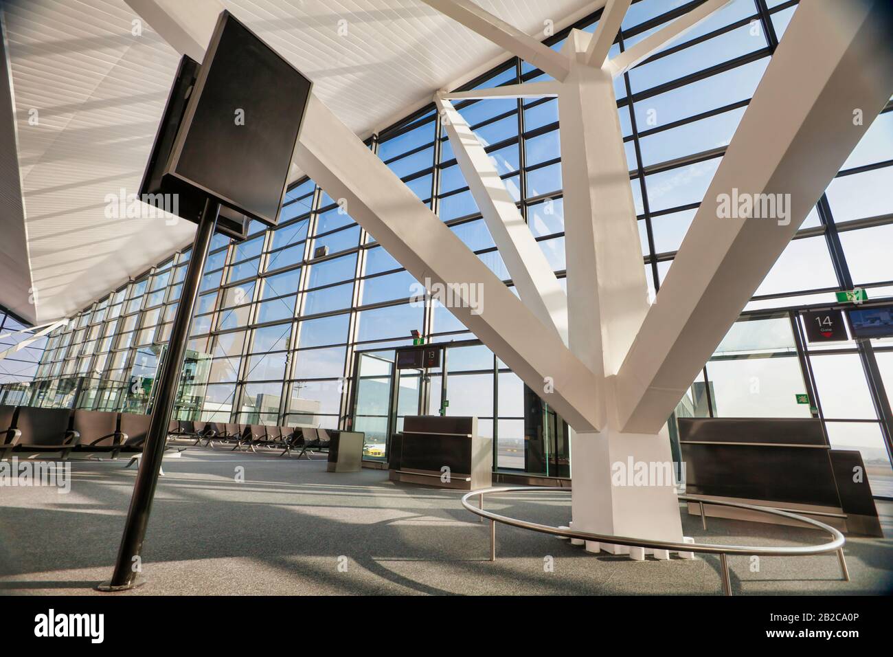 Flight display monitor in airport Stock Photo - Alamy