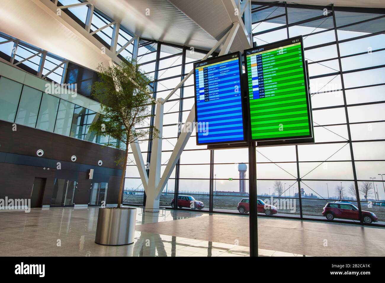 Flight display monitor in airport Stock Photo - Alamy