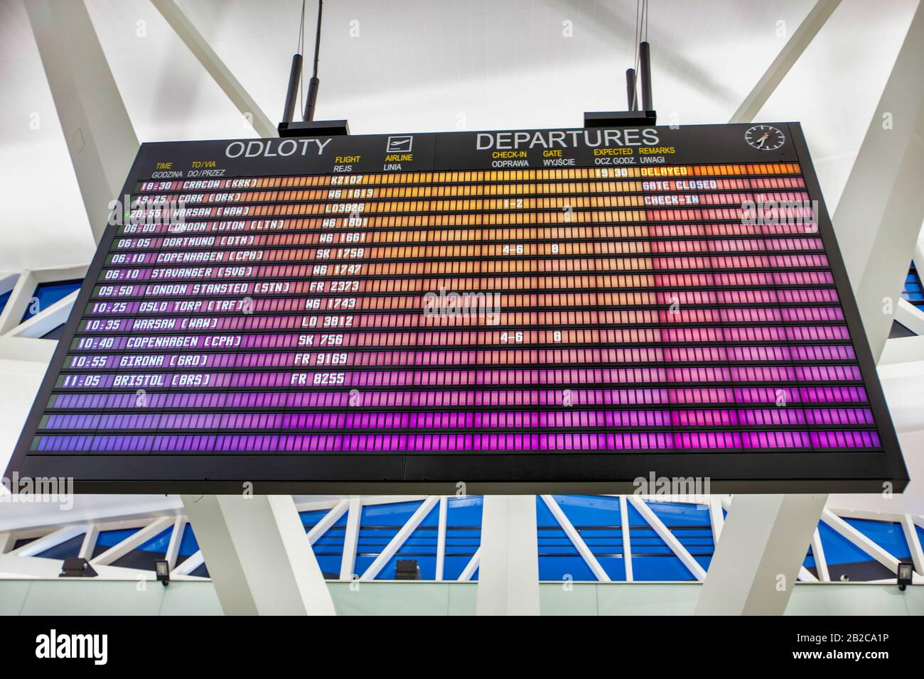 Flight display monitor in airport Stock Photo - Alamy