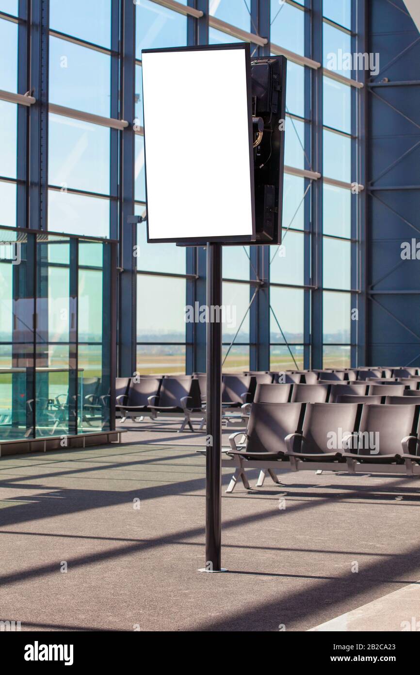 Flight display monitor in airport Stock Photo - Alamy