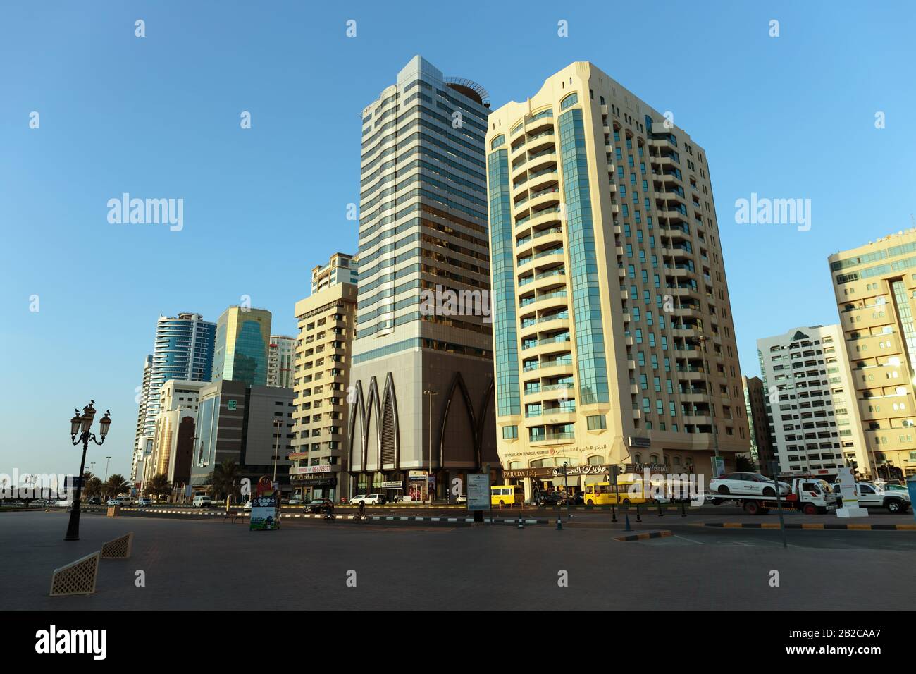 SHARJAH, UAE - NOVEMBER 6, 2013: Modern buildings in Sharjah. It is the ...