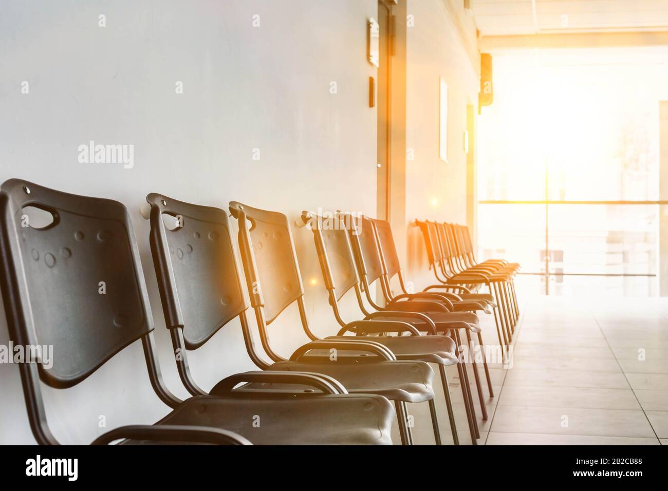Photo of empty chairs waiting area in university Stock Photo - Alamy