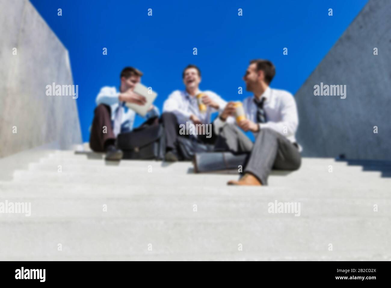 Businessman sitting on stairs hi-res stock photography and images - Alamy
