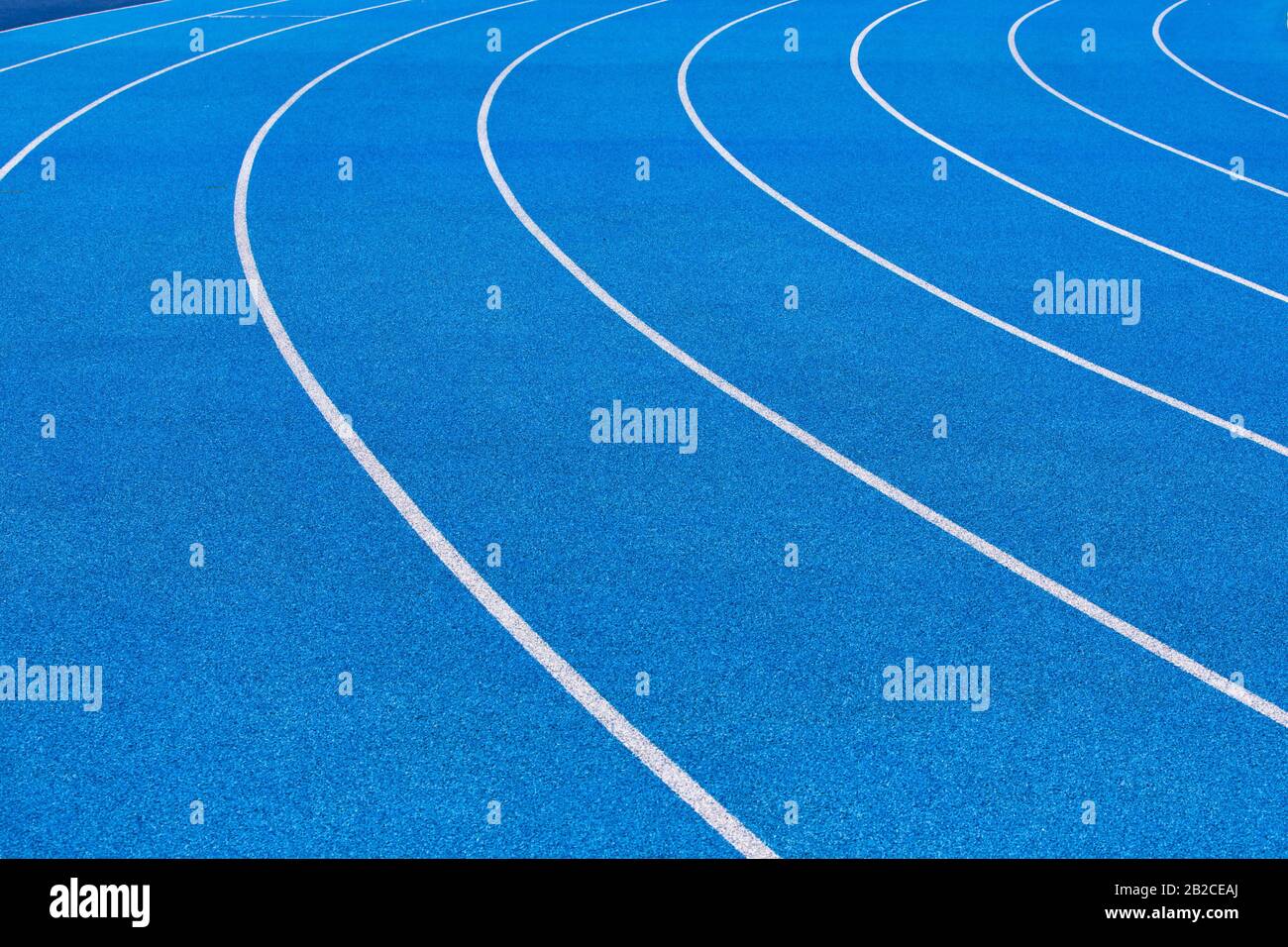 Photo of blue stadium tracks Stock Photo - Alamy