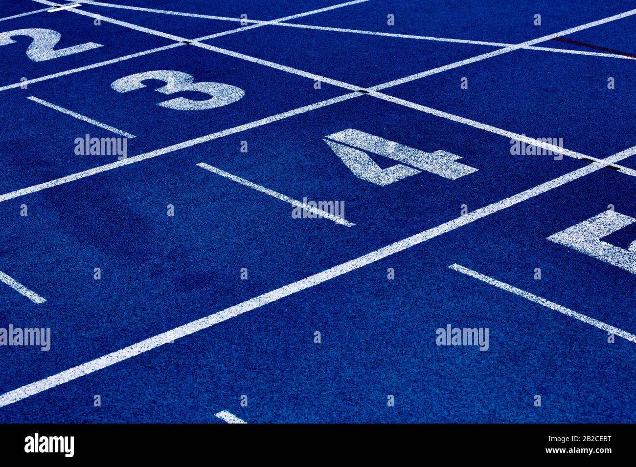 Photo of blue stadium tracks Stock Photo - Alamy