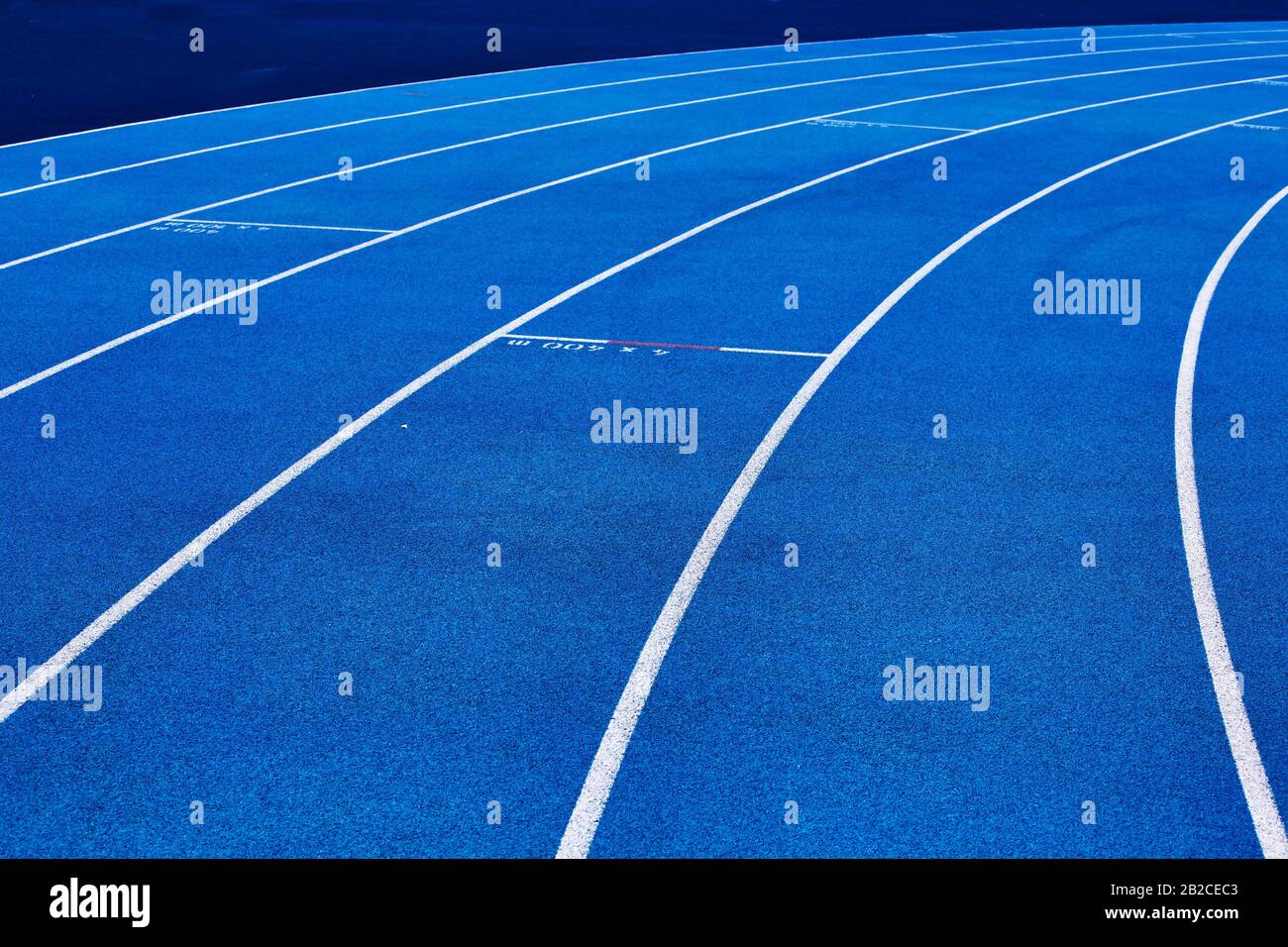 Photo of blue stadium tracks Stock Photo - Alamy