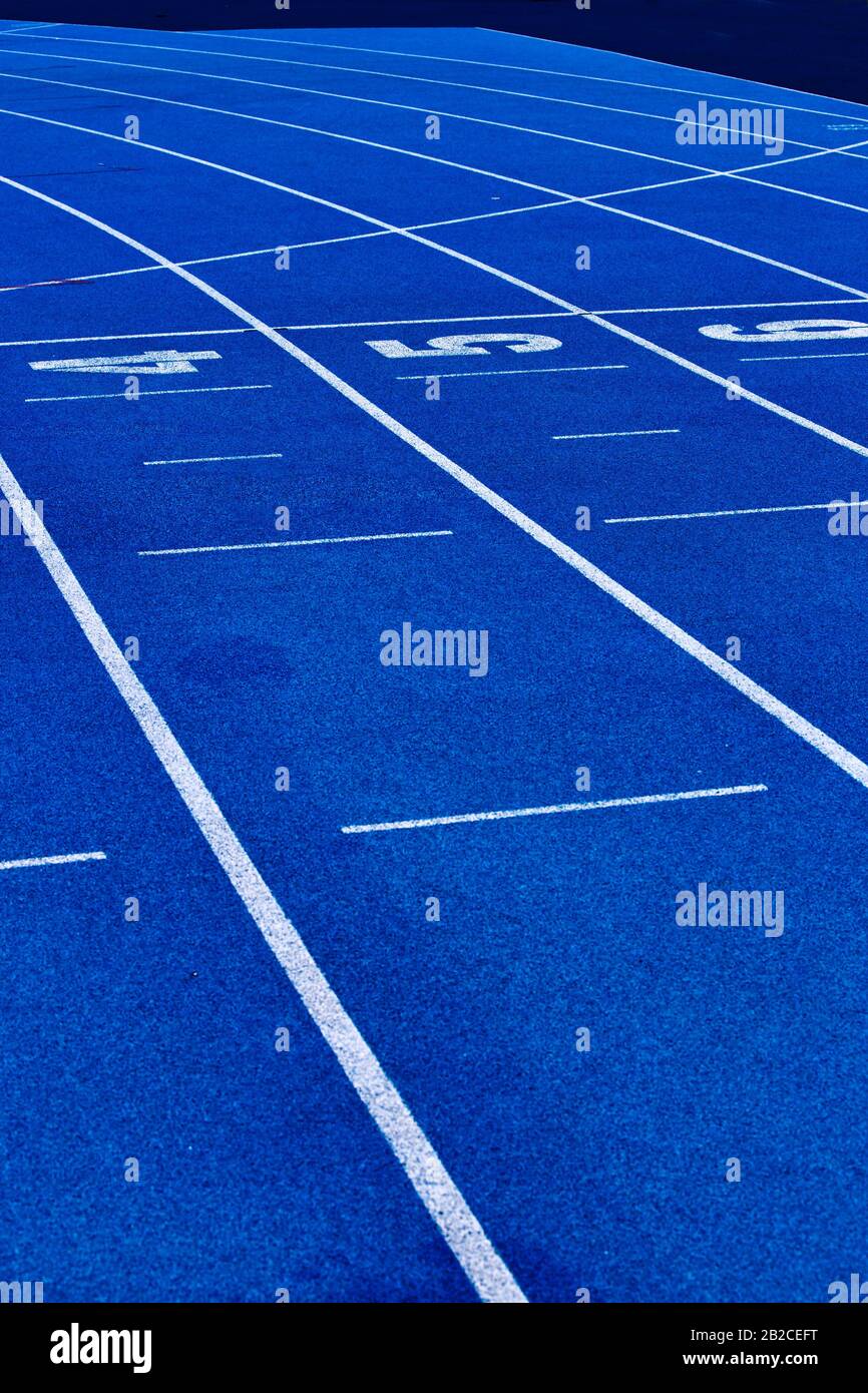 Photo of blue stadium tracks Stock Photo - Alamy