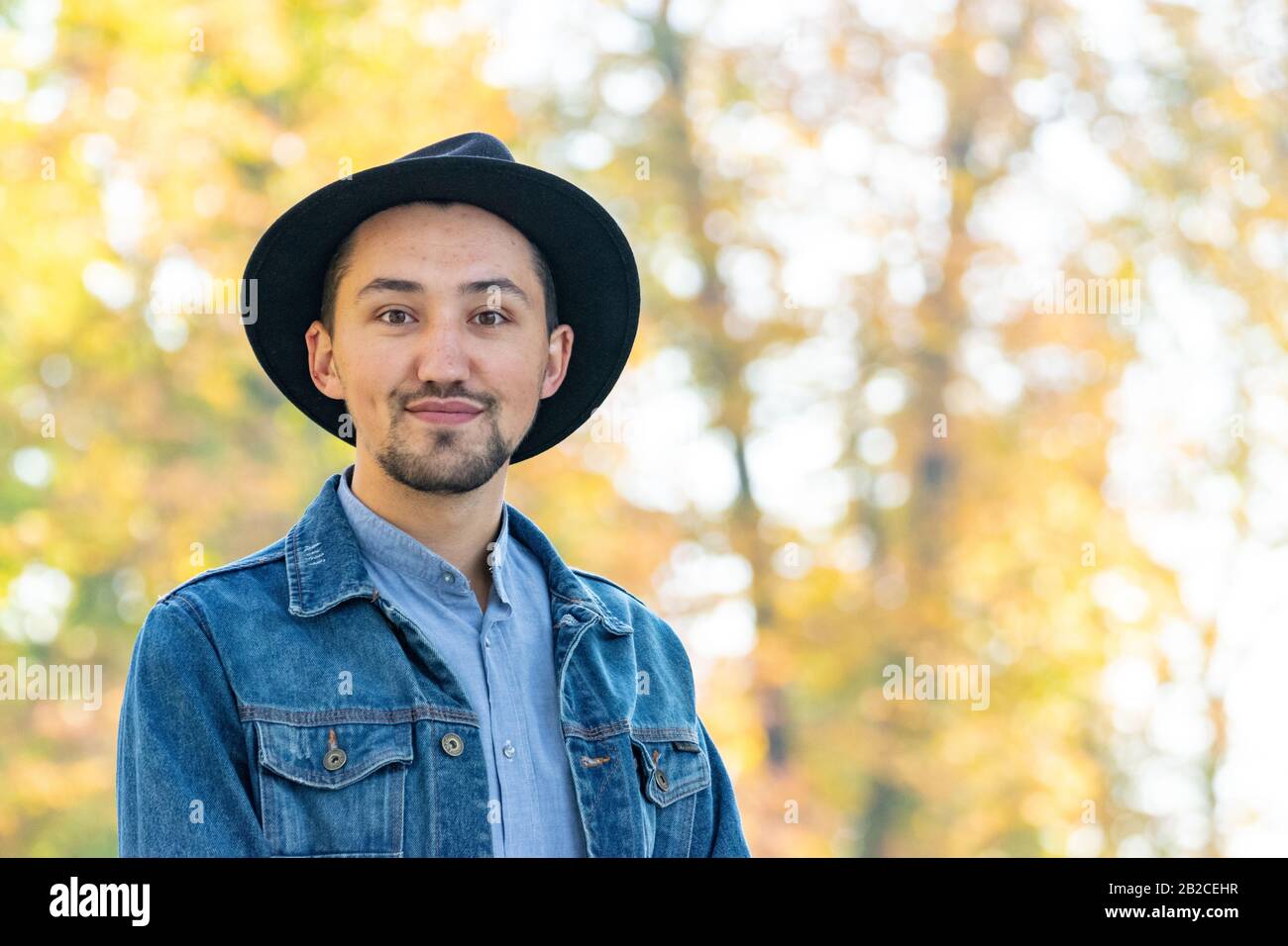 Handsome young man looking at the camera. Portrait of a confident and ...