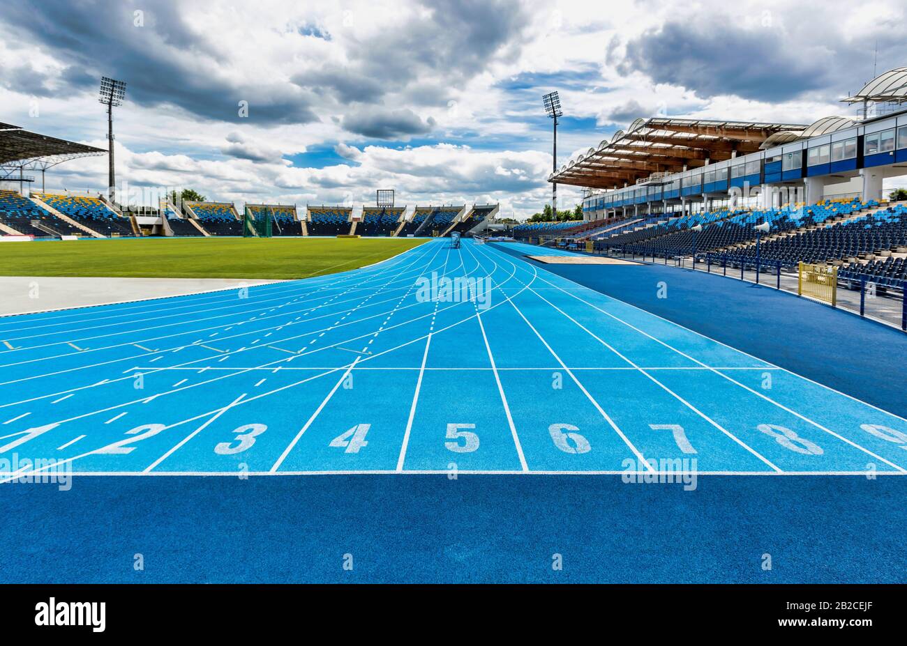 Photo of blue running tracks Stock Photo - Alamy