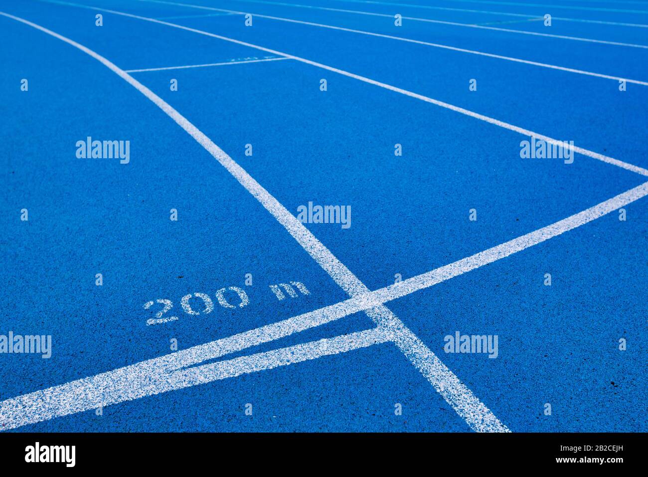Photo of 200 meter blue running tracks Stock Photo - Alamy
