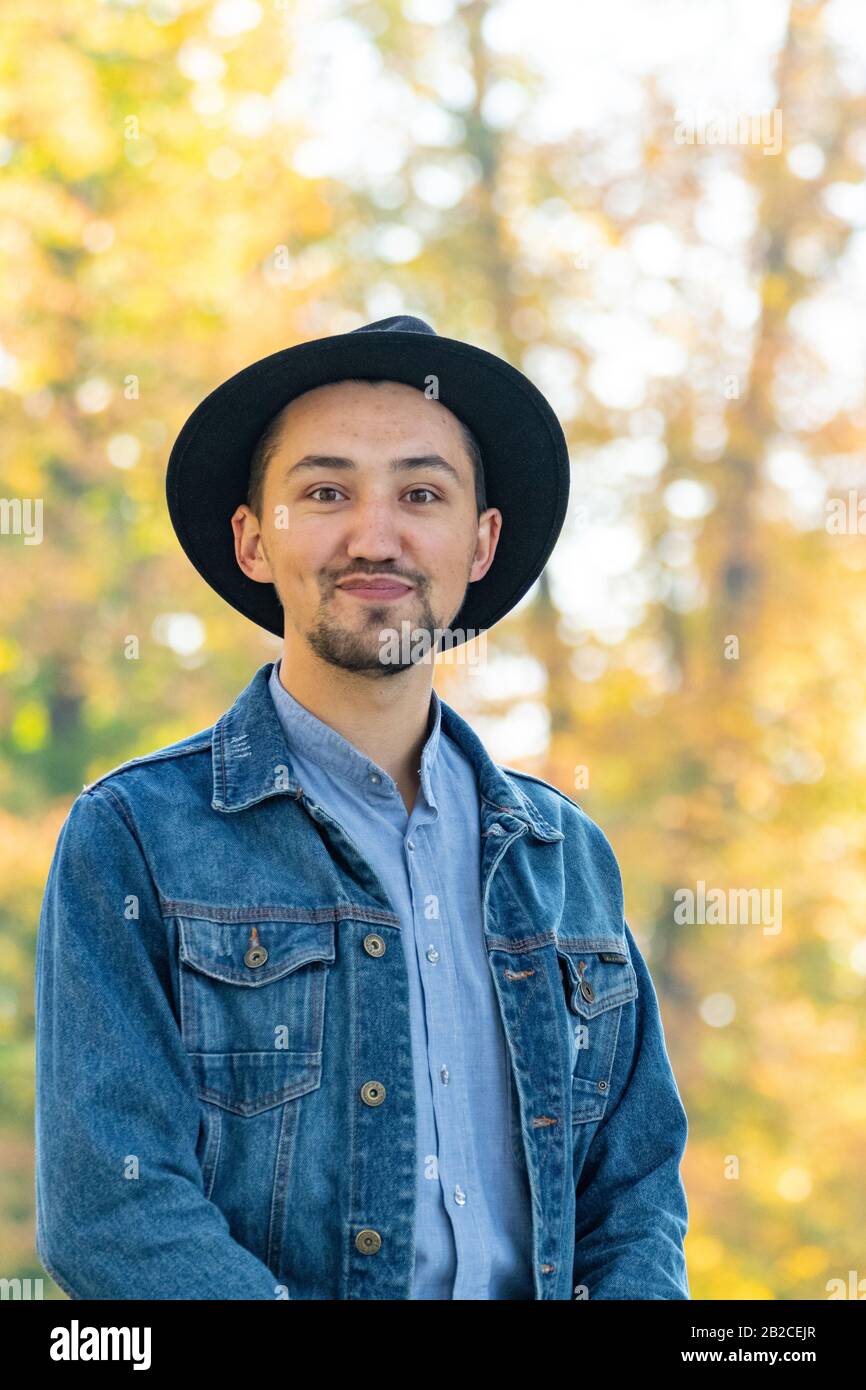 Handsome young man looking at the camera. Portrait of a confident and ...
