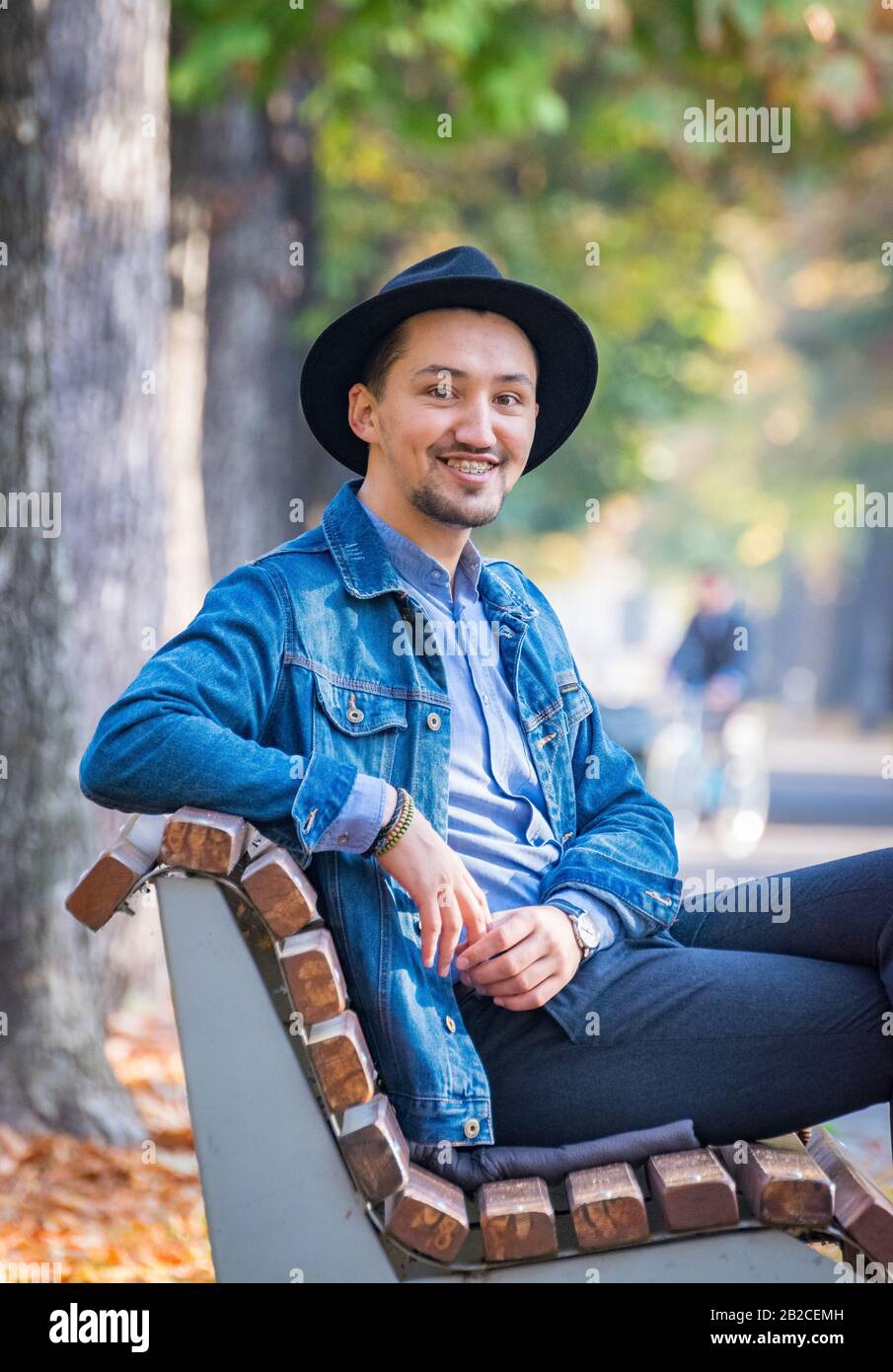 Handsome young man looking at the camera. Portrait of laughing ...