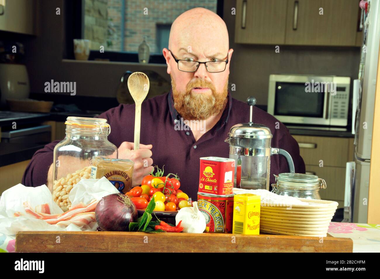 Confused man cook home hi-res stock photography and images - Alamy