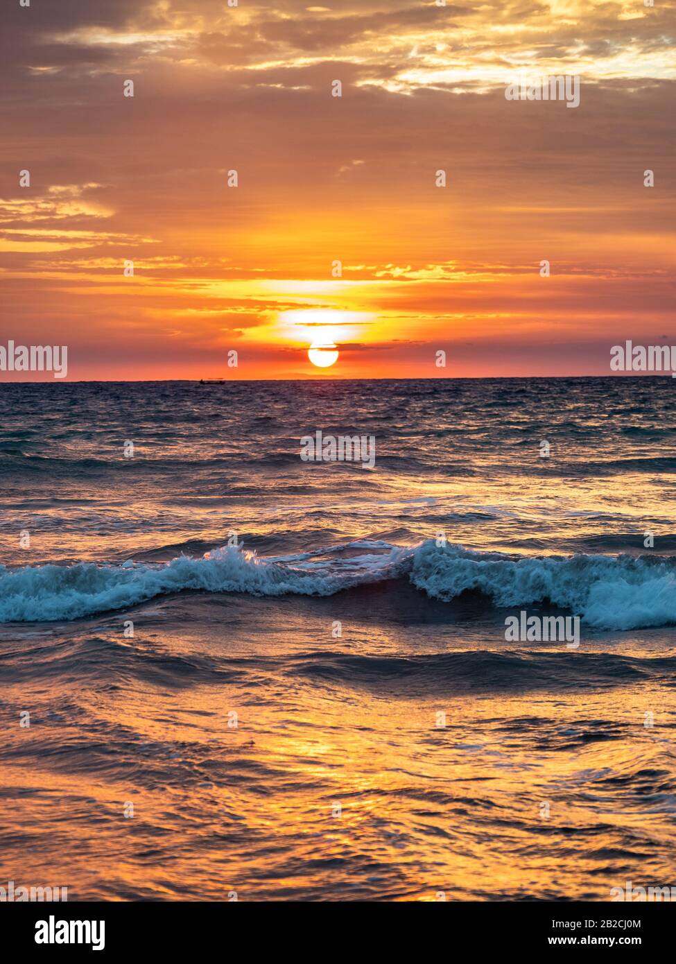 Sunset at Kuta beach in Bali Indonesia Stock Photo - Alamy