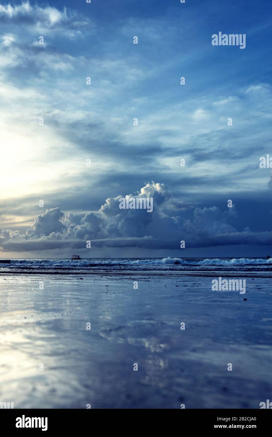 Sunset at Kuta beach in Bali Indonesia Stock Photo - Alamy