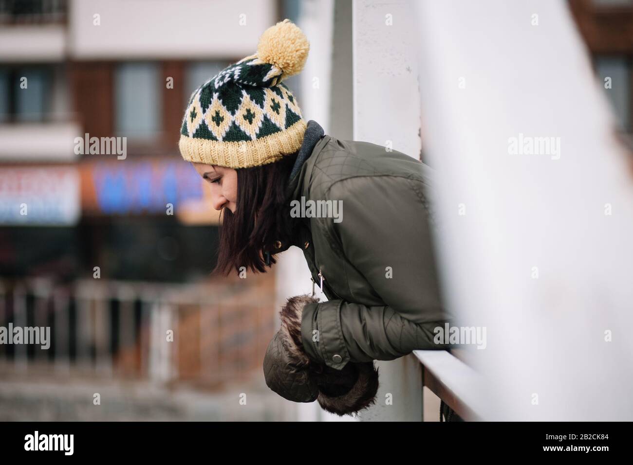 Girl Leaning Over Fence High Resolution Stock Photography and Images ...