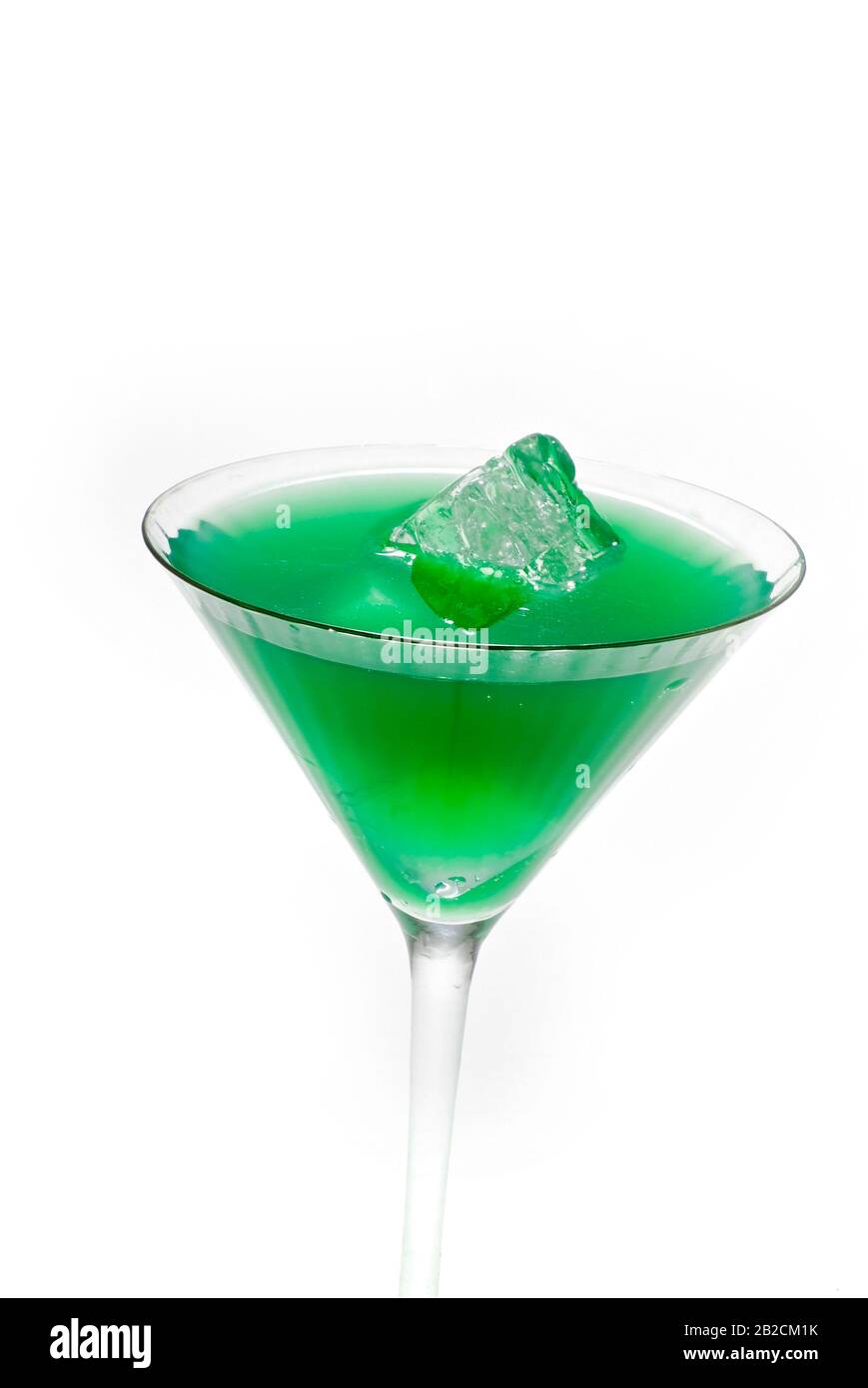 studio shot of a green coctail on rocks in nice glass isolated on white ...