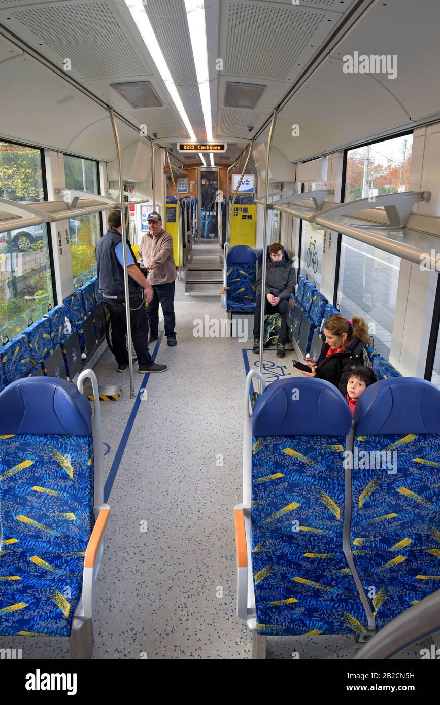 passengers on a Coradia LINT 41 dmu train built by Alstom, operated by ...