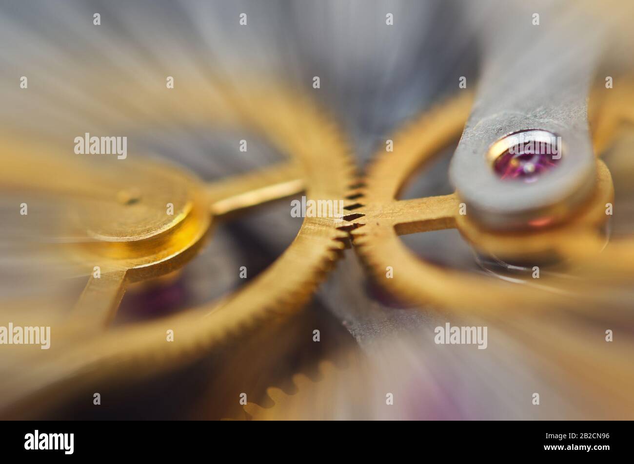 Metal Cogwheels in clock mechanism , abstract sun beams, Concept ...