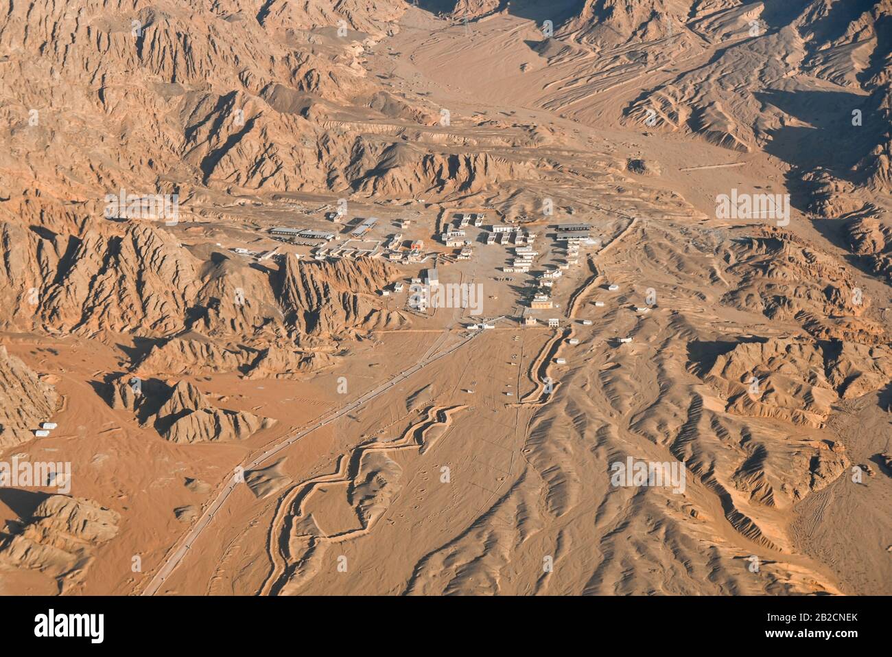Desert city among mountains and sands, view from above Stock Photo - Alamy