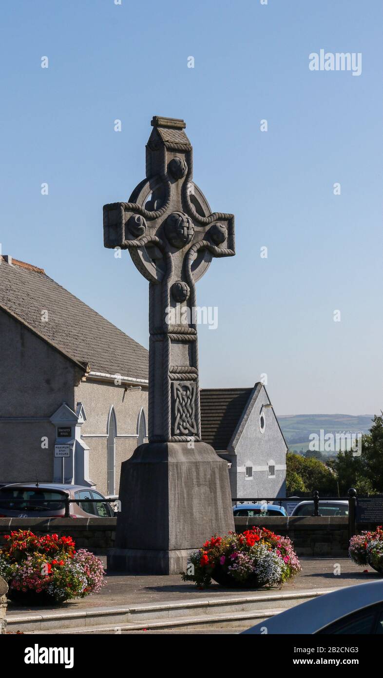 Modern Celtic high cross or Irish standing cross in strong autumn ...