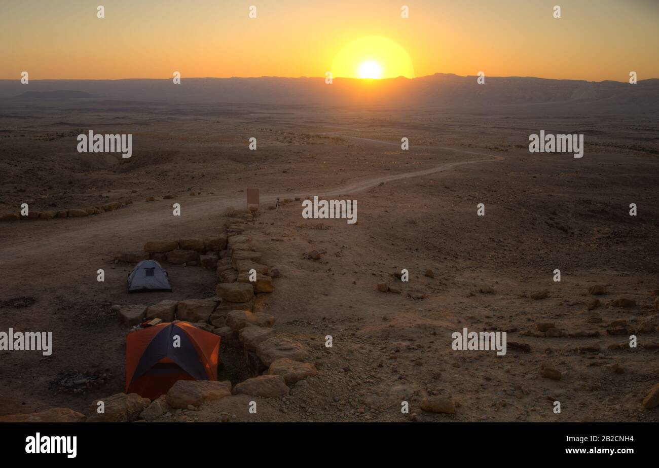 SUnset colors in camping of desert in Israel tourism Stock Photo - Alamy