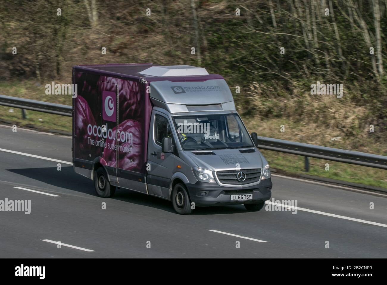 Ocado food grocer delivery van driving on the M6 motorway near Preston ...