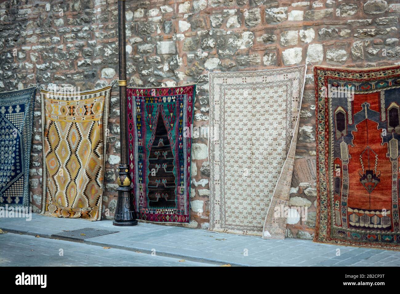 Old hand made carpet and rugs of traditional types Stock Photo - Alamy