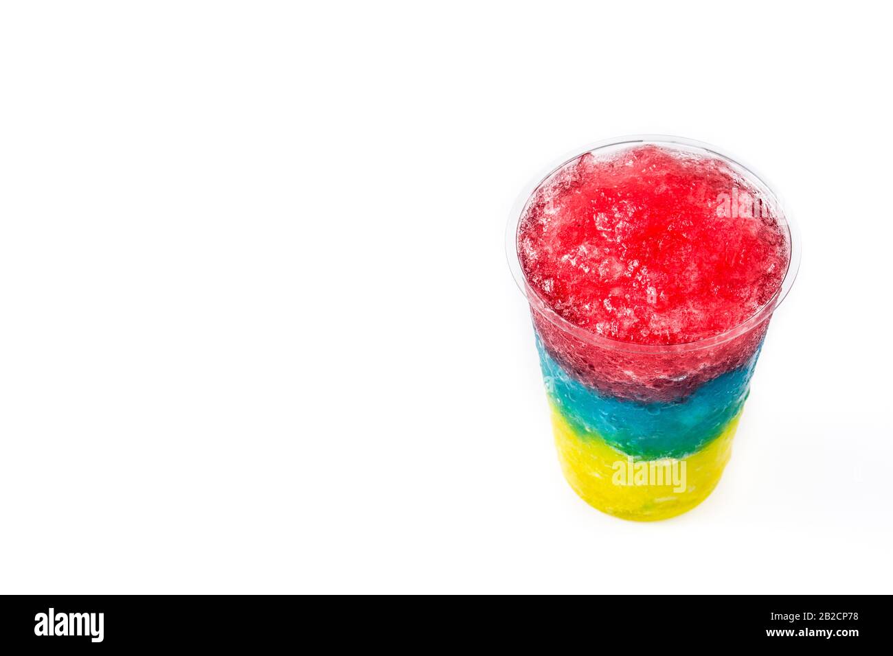 Colorful slushie of differents flavors with straw in plastic cup ...