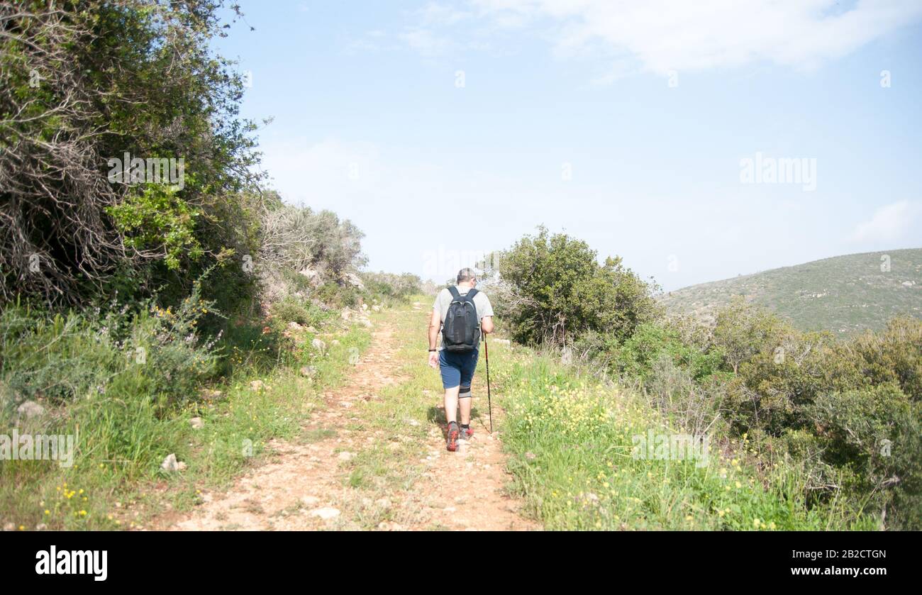 Hiking in Israeli nature landscape with good weather under cloudy sky ...