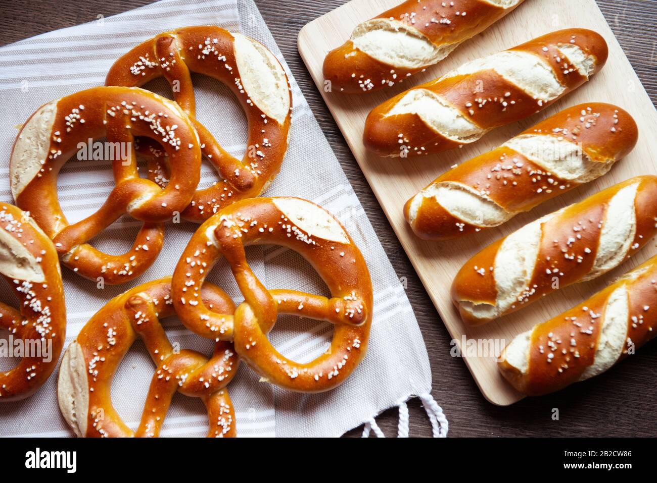 Closeup photo of lye roll bun and bavarian pretzel in bakery Stock ...