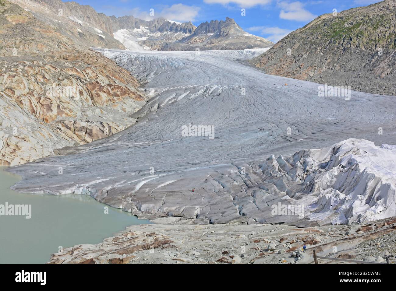 The Rhone Glacier and the glacial lake which marks the birth of the ...