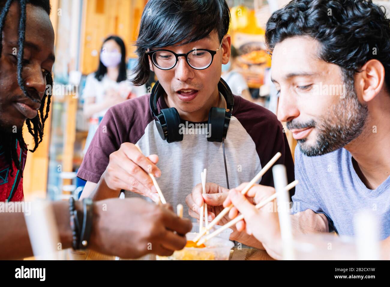 Group friends share eat hi-res stock photography and images - Alamy