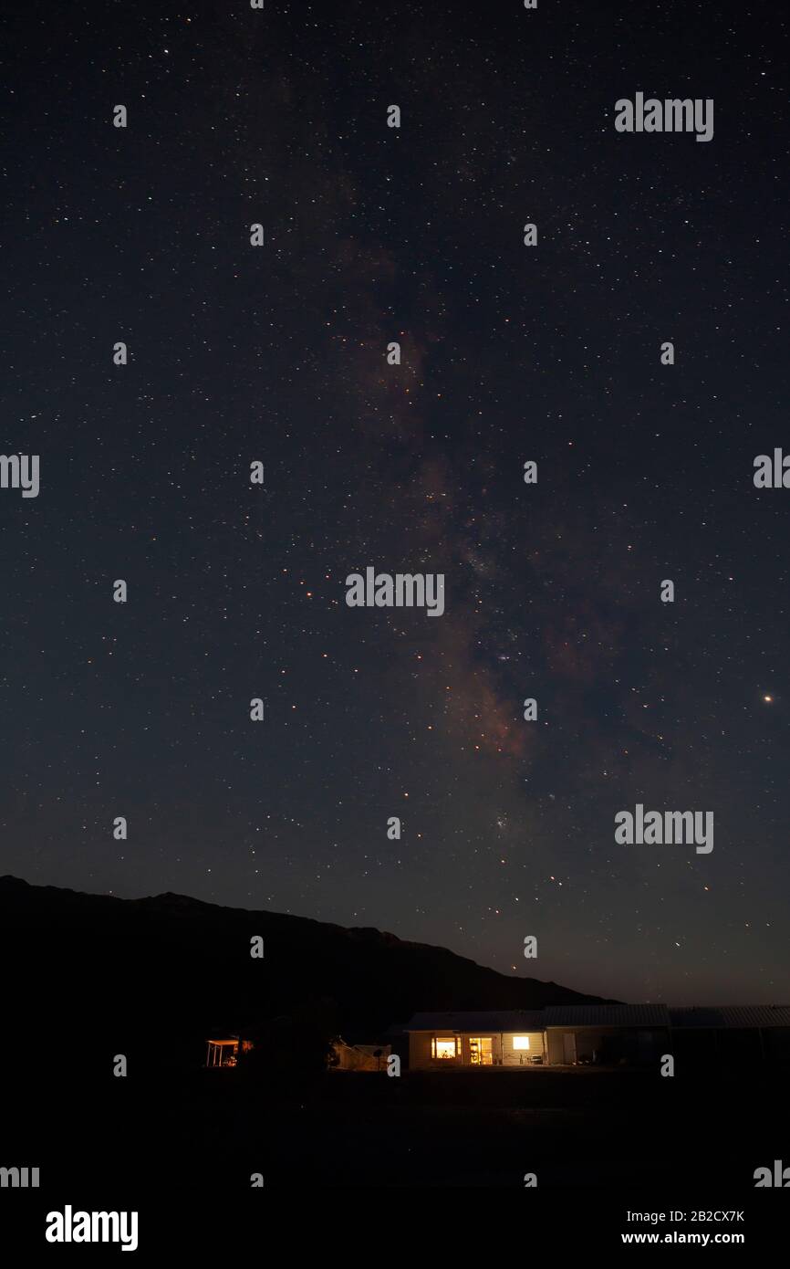 Starry night with milky way visible in the dark and clean sky of the ...