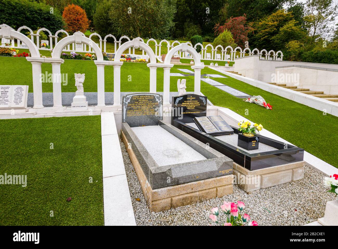 Memorial arches and graves, Bryntaf Cemetery, Aberfan Cemetery ...