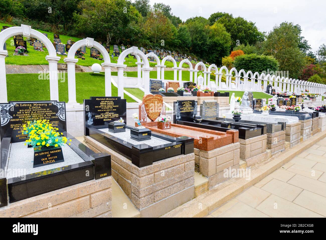 Memorial arches and graves, Bryntaf Cemetery, Aberfan Cemetery ...