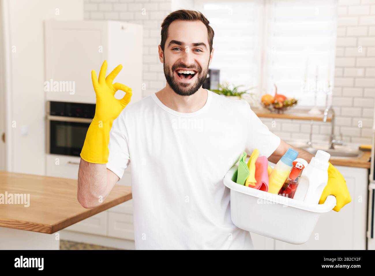Caucasian man keeping house clean hi-res stock photography and images ...