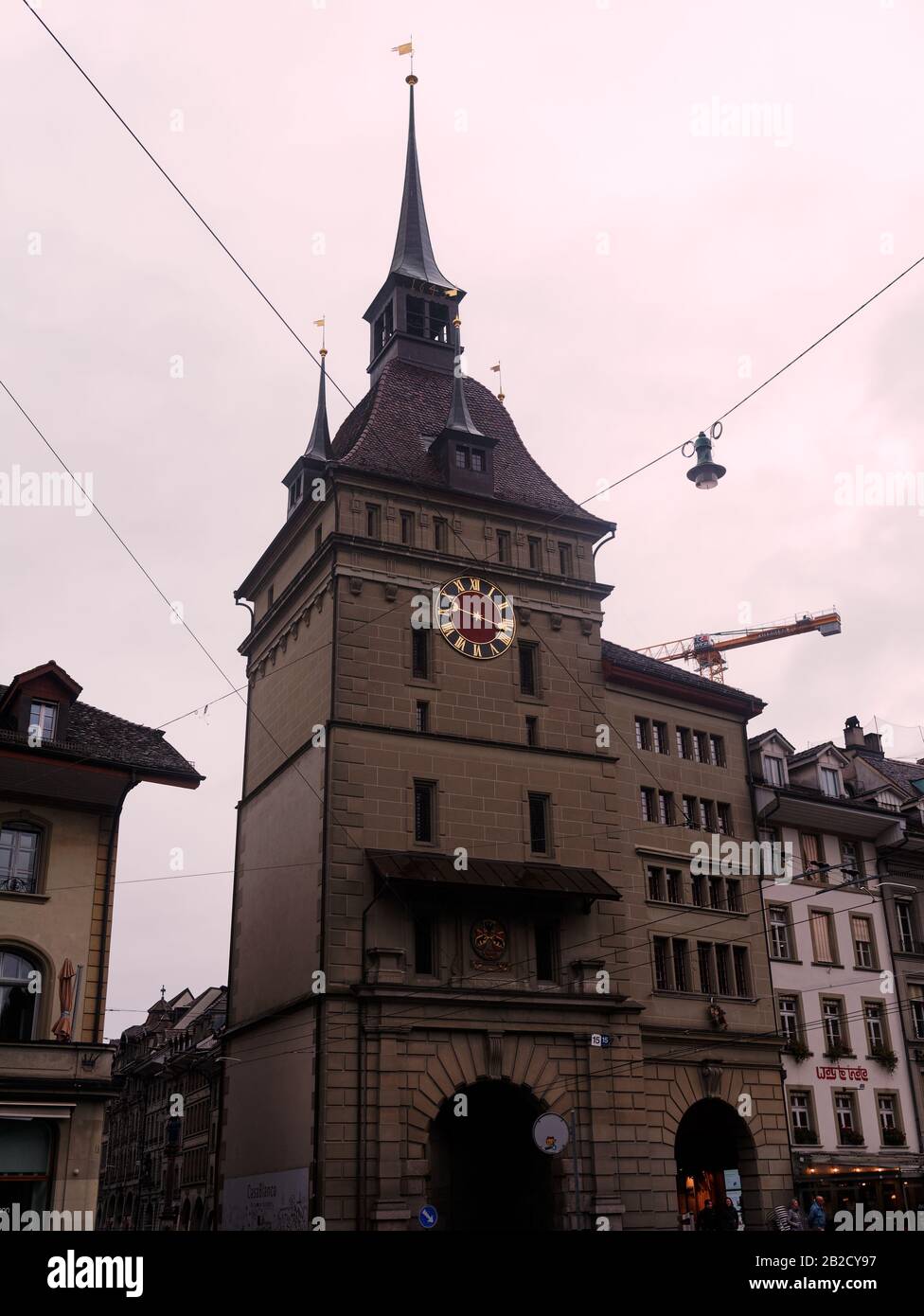 Käfigturm, a 17th-century Baroque tower with a clock and bell at dusk ...